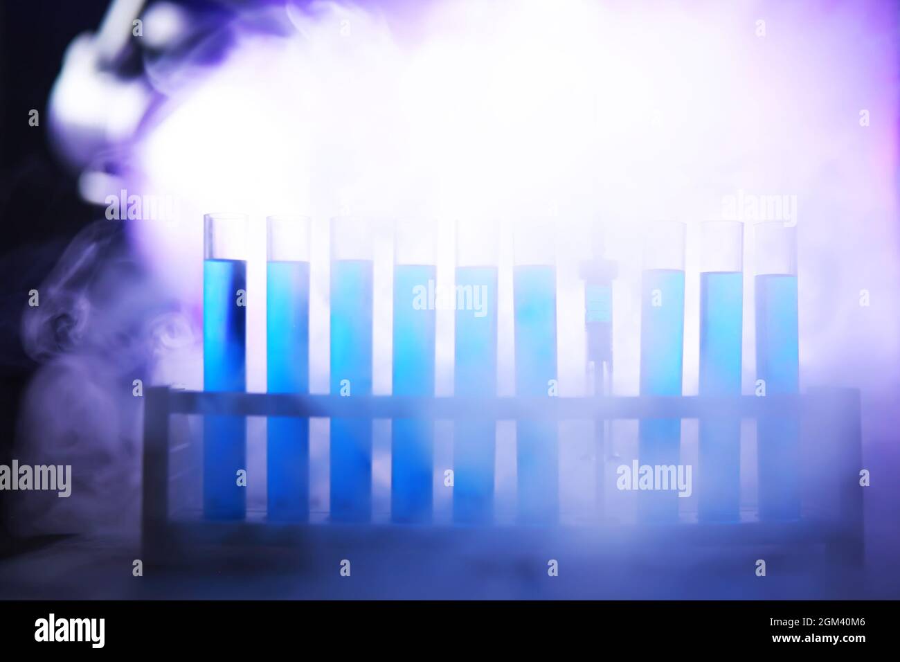 Test tube of glass overflows new liquid solution potassium blue ...