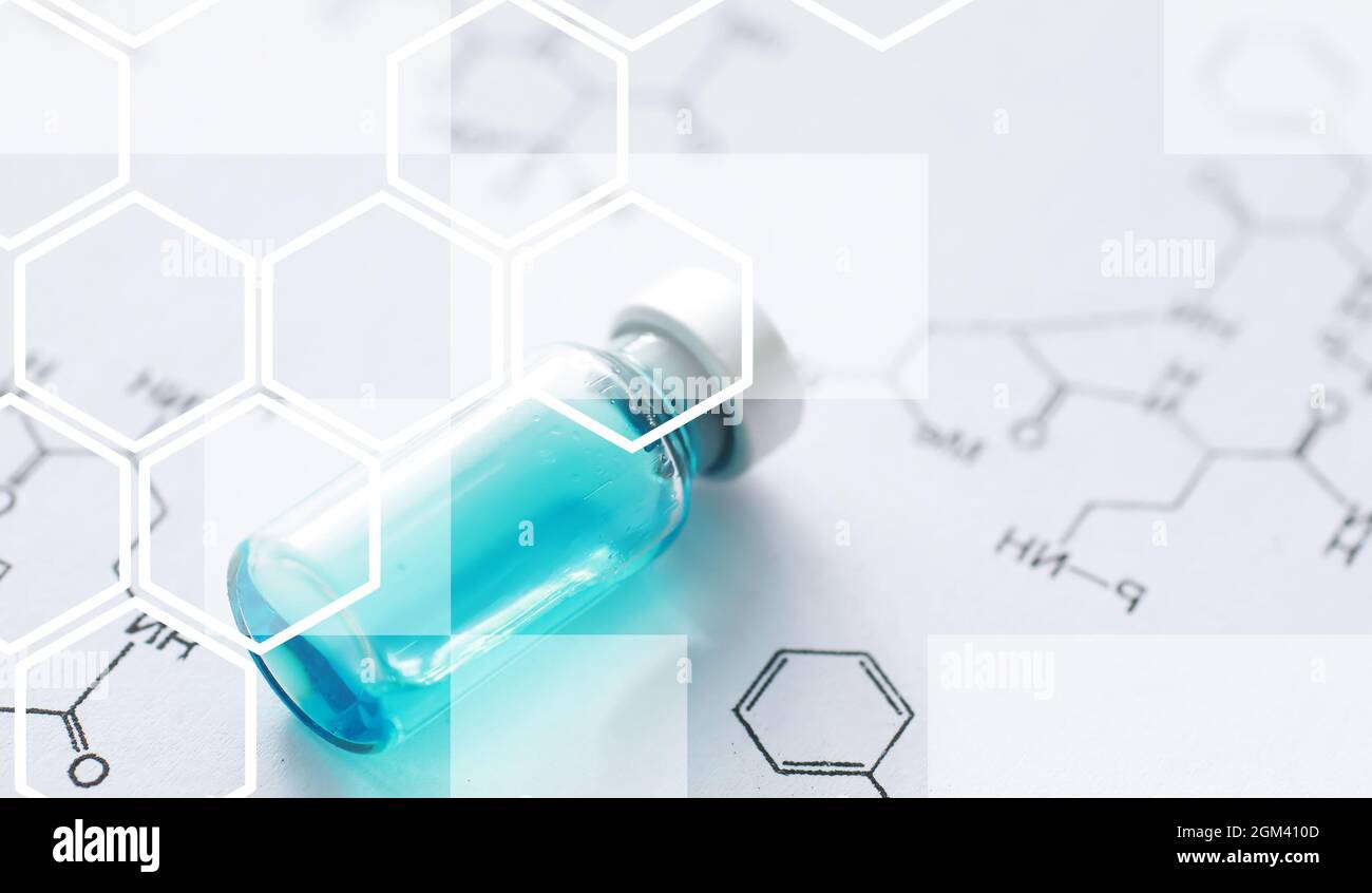 small jars with injection and syringe for injection on blue background ...