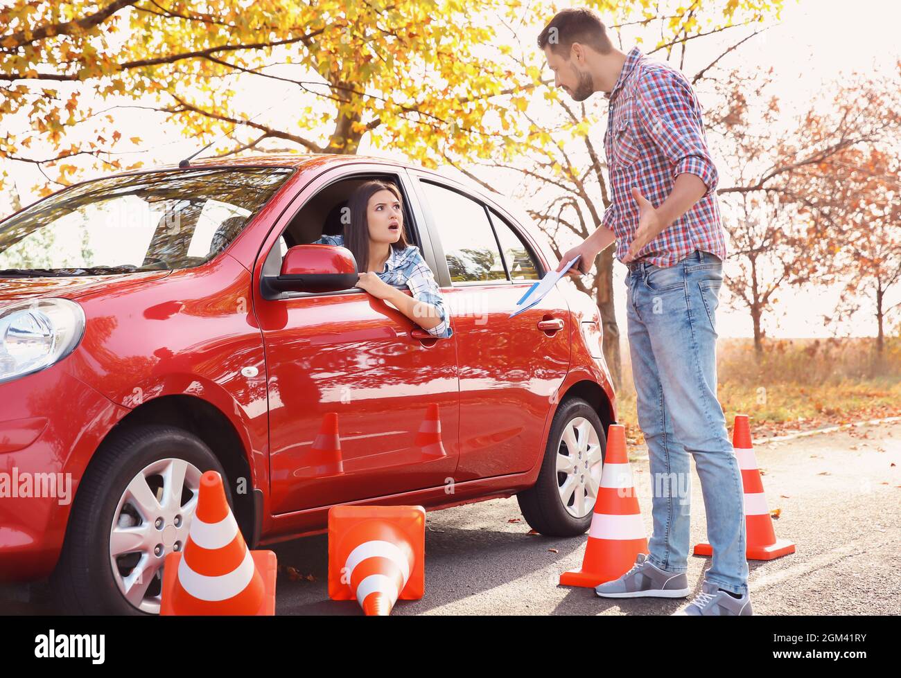 Young woman passing driving license exam Stock Photo - Alamy