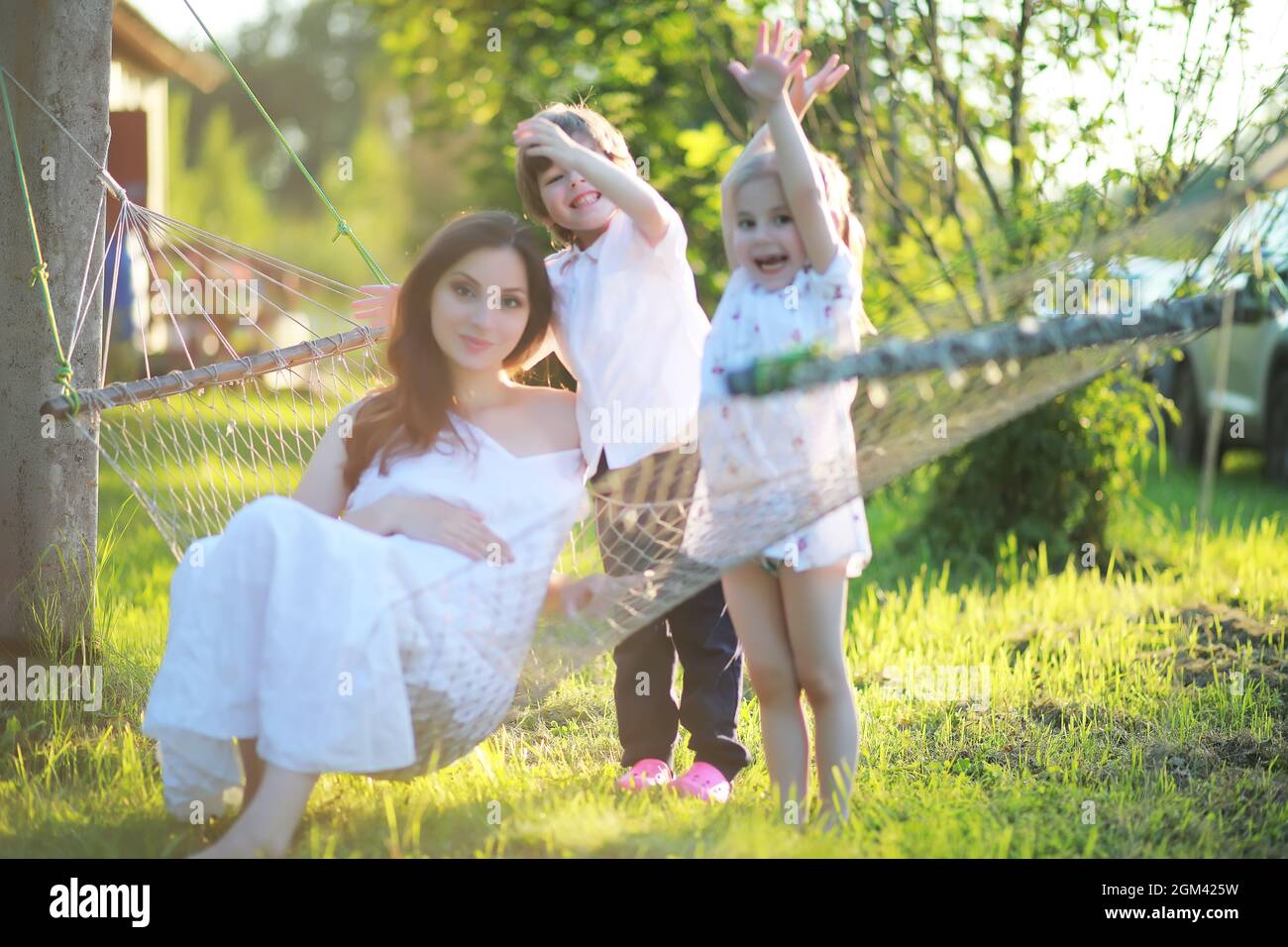 The family is resting in nature. Vacations in the fresh air. Weekend ...