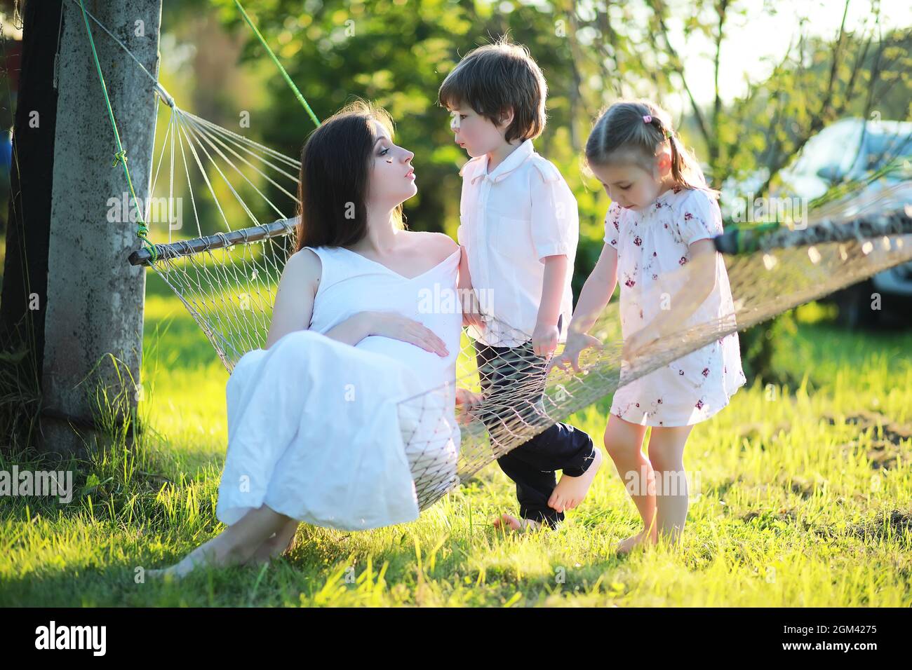 The family is resting in nature. Vacations in the fresh air. Weekend ...