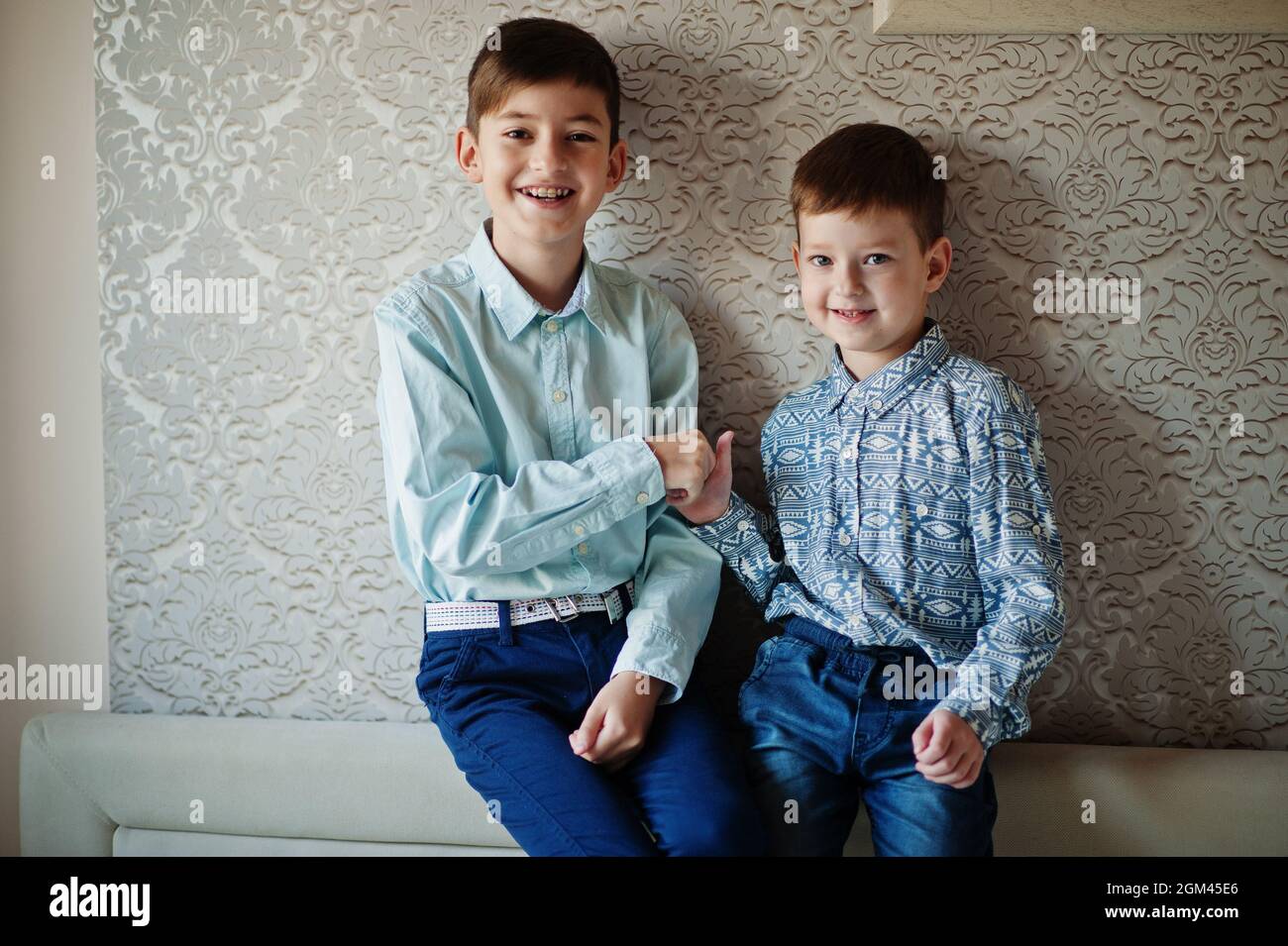 Two brothers play hand game with fingers Stock Photo - Alamy