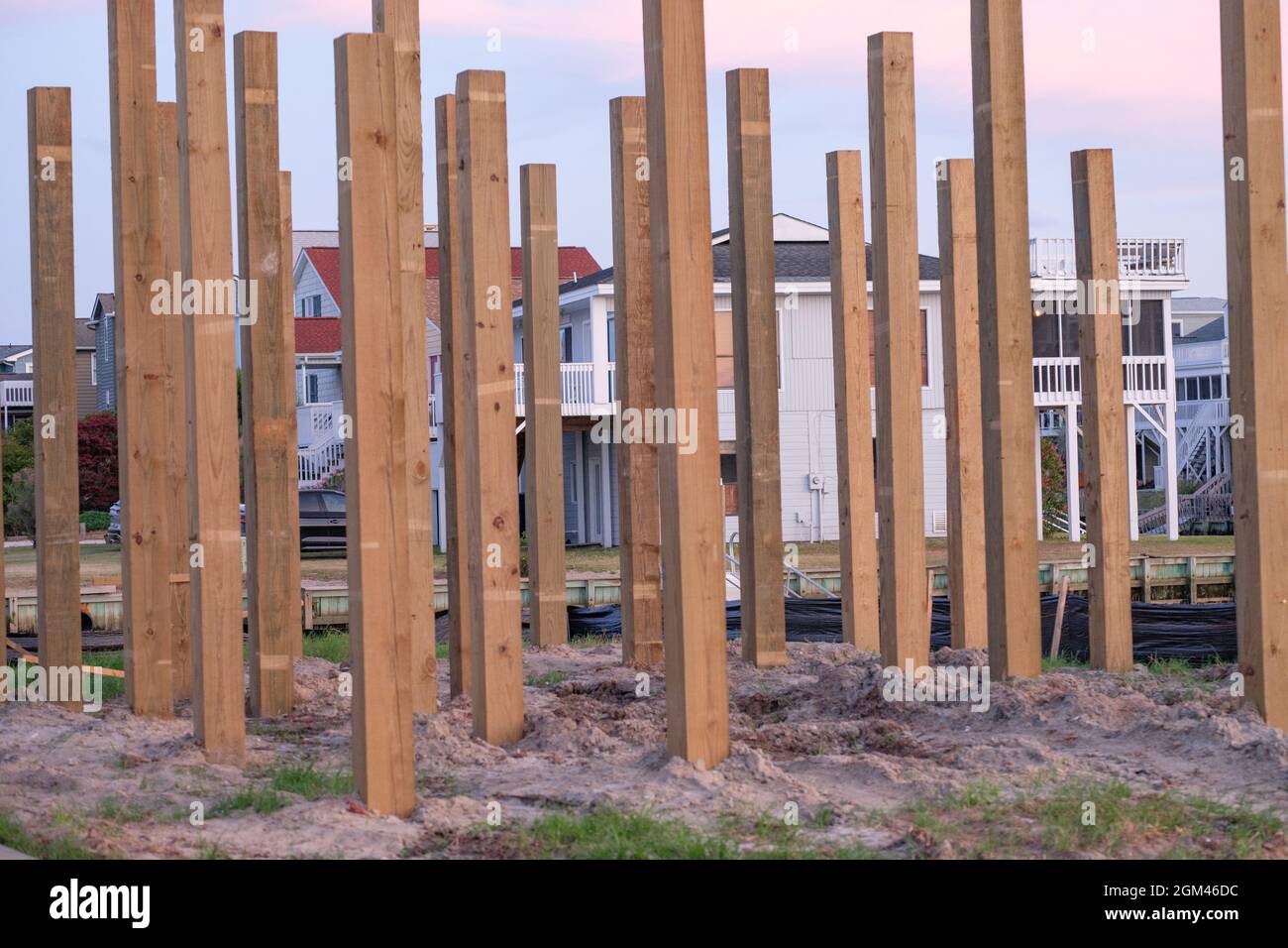 Beach Construction - Housing Pylons Stock Photo - Alamy