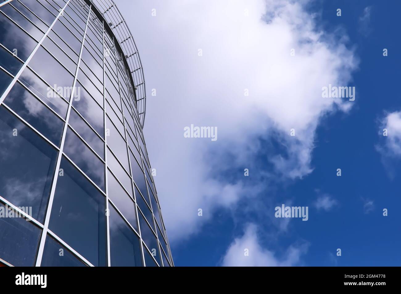 Architectural detail of the facade with multiple reflections of other ...