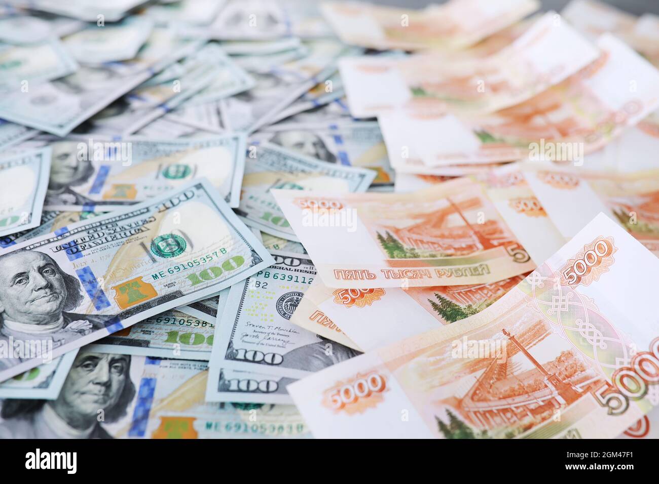Cash money in a large pile as a finance background. Paper money close ...