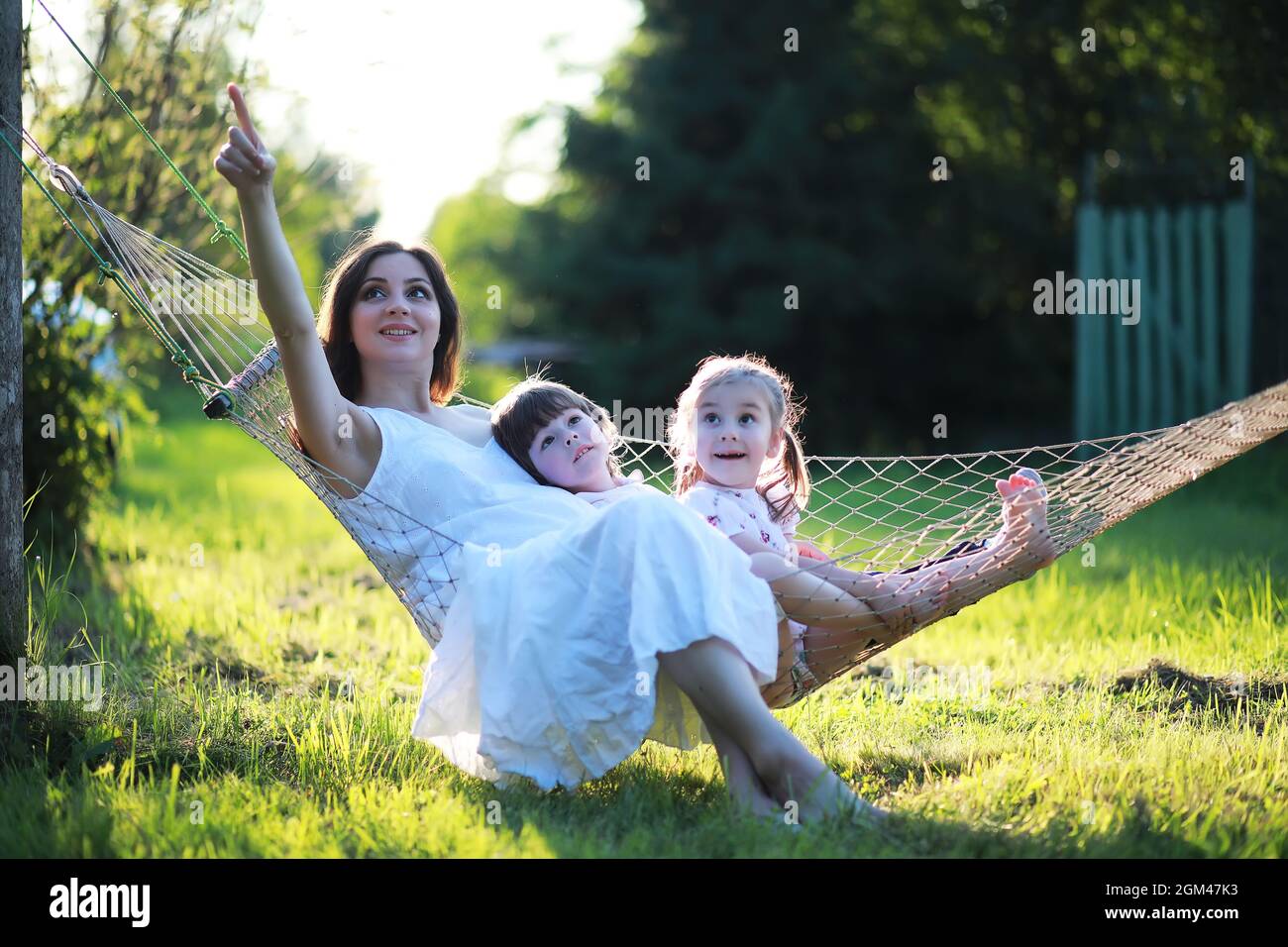 The family is resting in nature. Vacations in the fresh air. Weekend ...