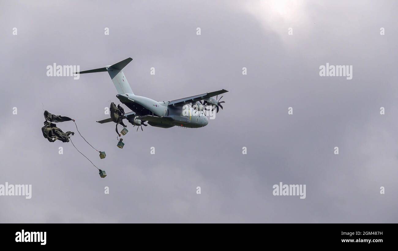 RAF Airbus A400M Atlas on a low level pass dropping pallet supplies by ...