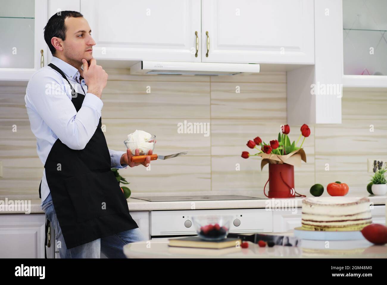 Young female baker working colleague hi-res stock photography and ...