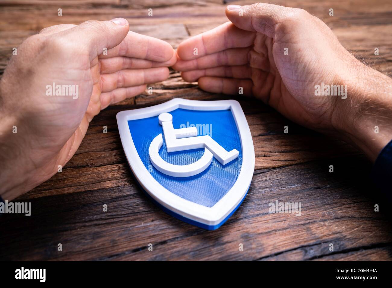 Hands Protecting Disabled Worker Handicap Shield Icon Stock Photo - Alamy