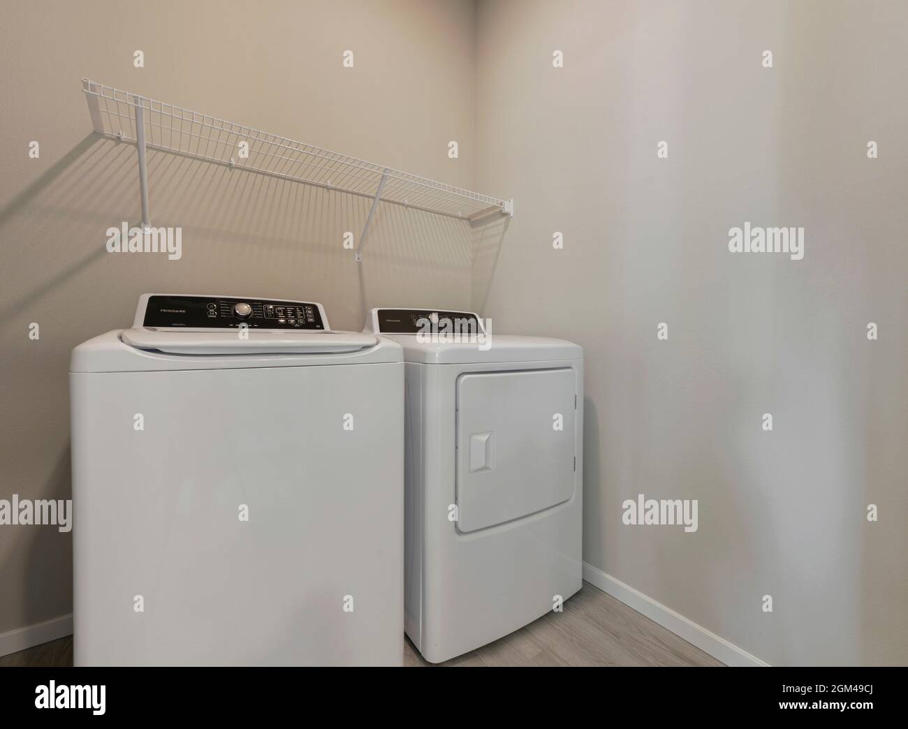 Modern residential laundry room interior Stock Photo - Alamy