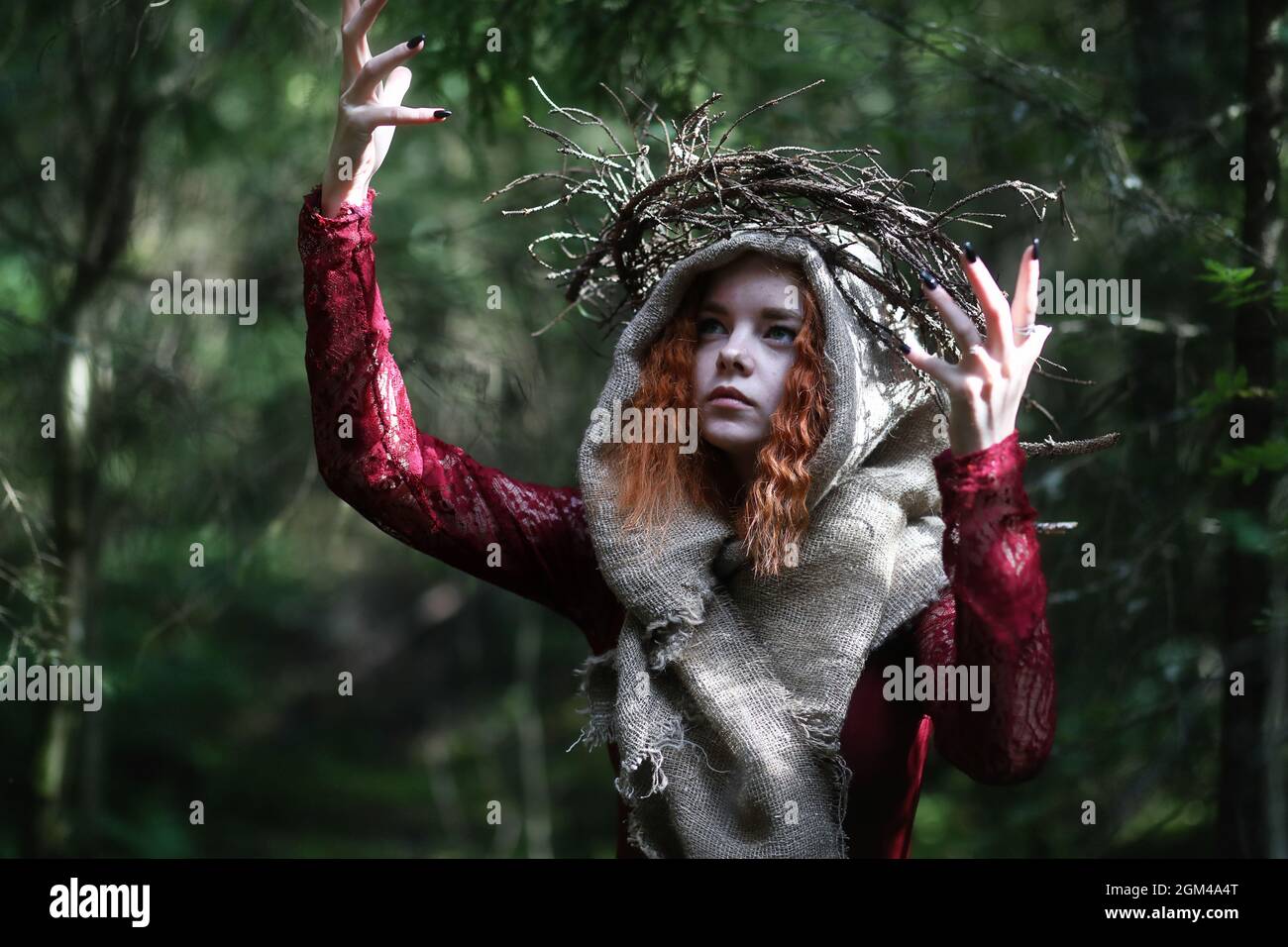 Fortune-teller conducts a ritual in the depths of the forest Stock ...