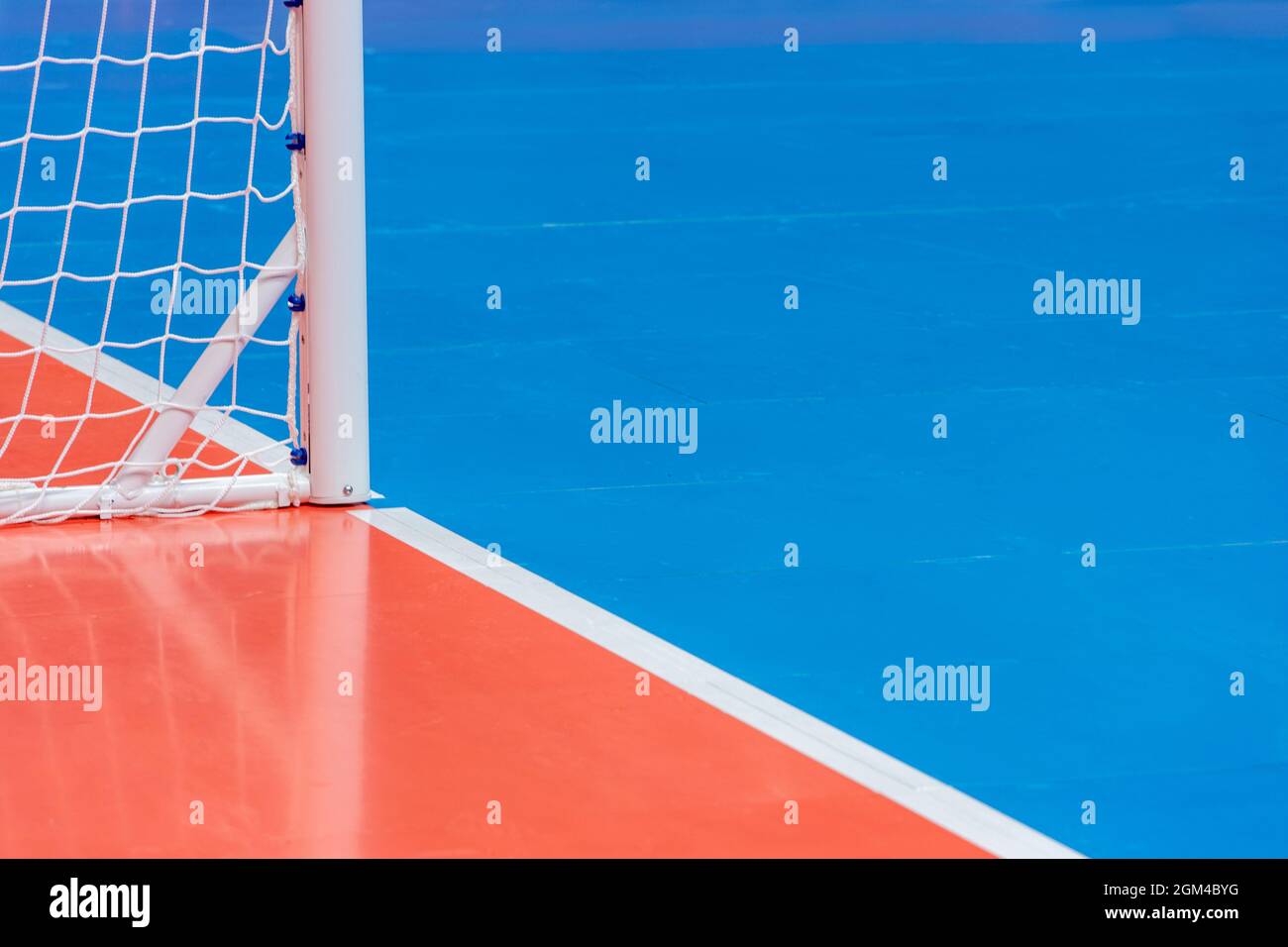Field hockey, futsal or handball gate equipment in a sports hall gym ...