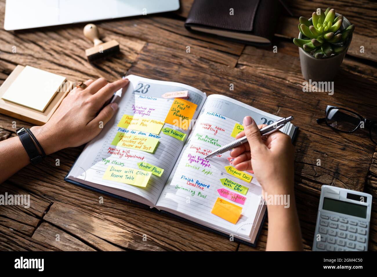 Calendar Schedule Agenda Or Organizer At Desk Stock Photo - Alamy
