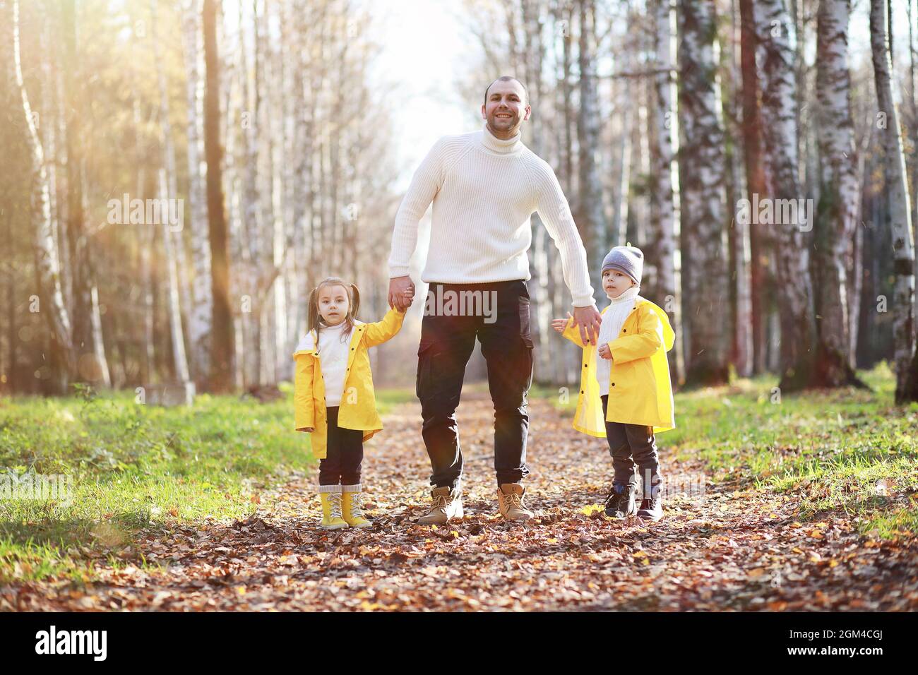 Children walk in the autumn park in the fall Stock Photo - Alamy