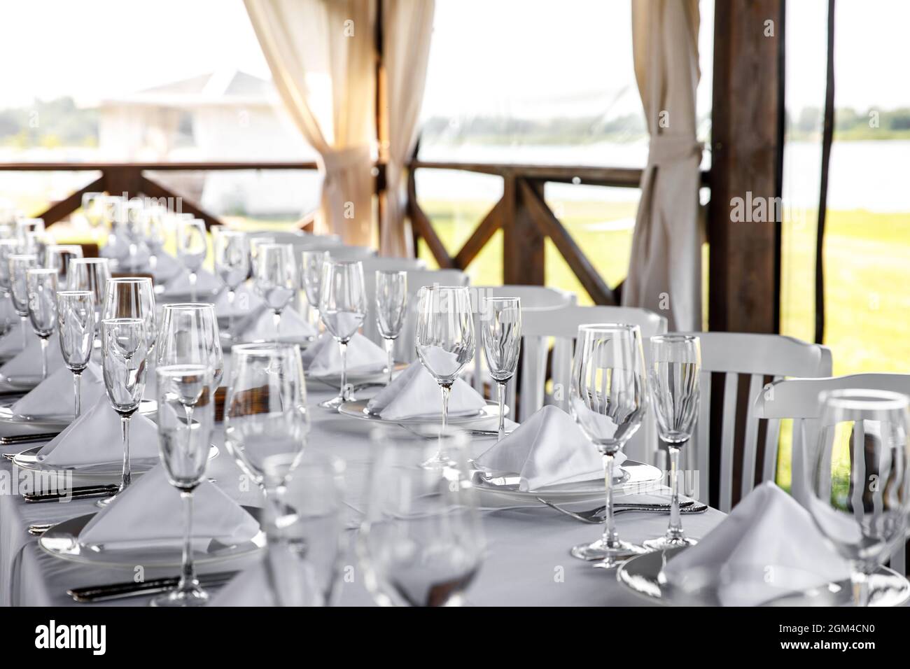 Banquet table in the restaurant, the preparation before the banquet ...
