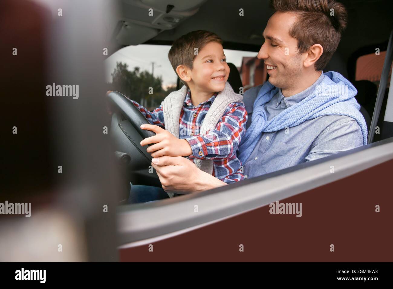 Father Teaching Son To Drive High Resolution Stock Photography and ...