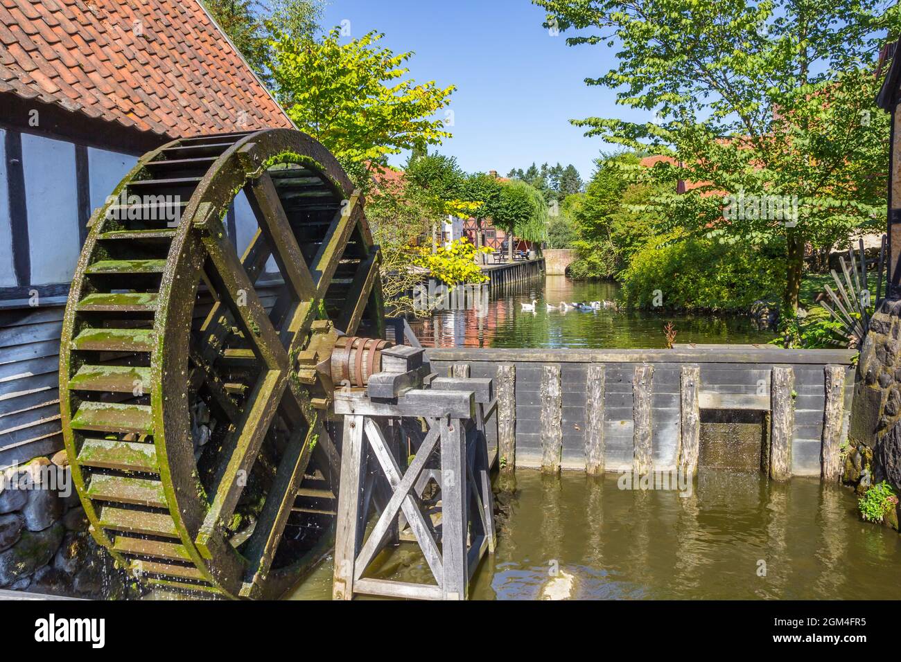 Wooden wheel of a historic water mill in the old town of Aarhus ...