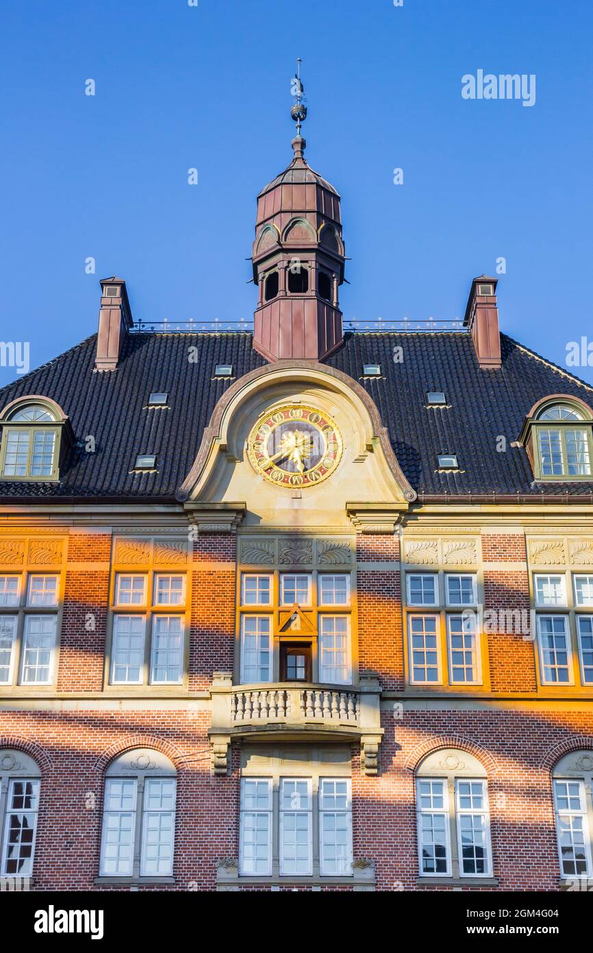 Orange light on the front facade of the courthouse in Aarhus, Denmark ...