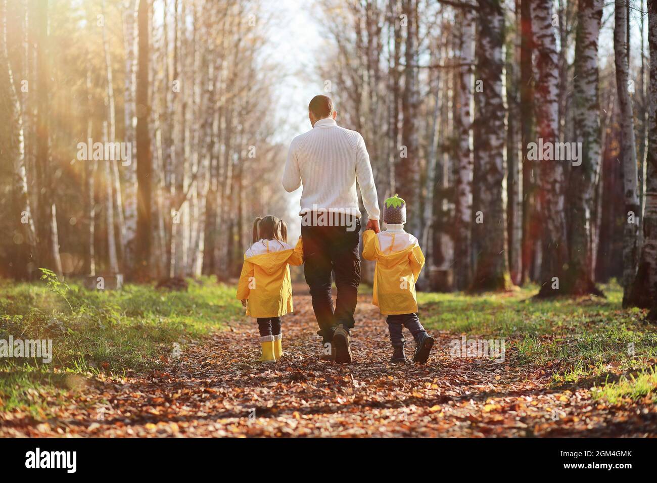 Children walk in the autumn park in the fall Stock Photo - Alamy