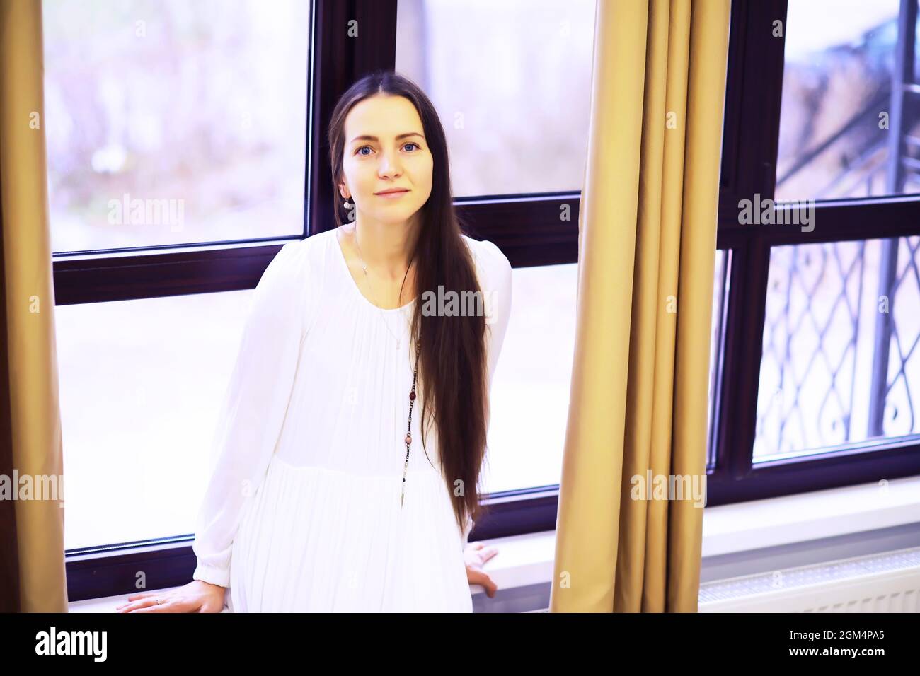 Relaxed serene pretty young woman at home, happy calm lady dream enjoy ...