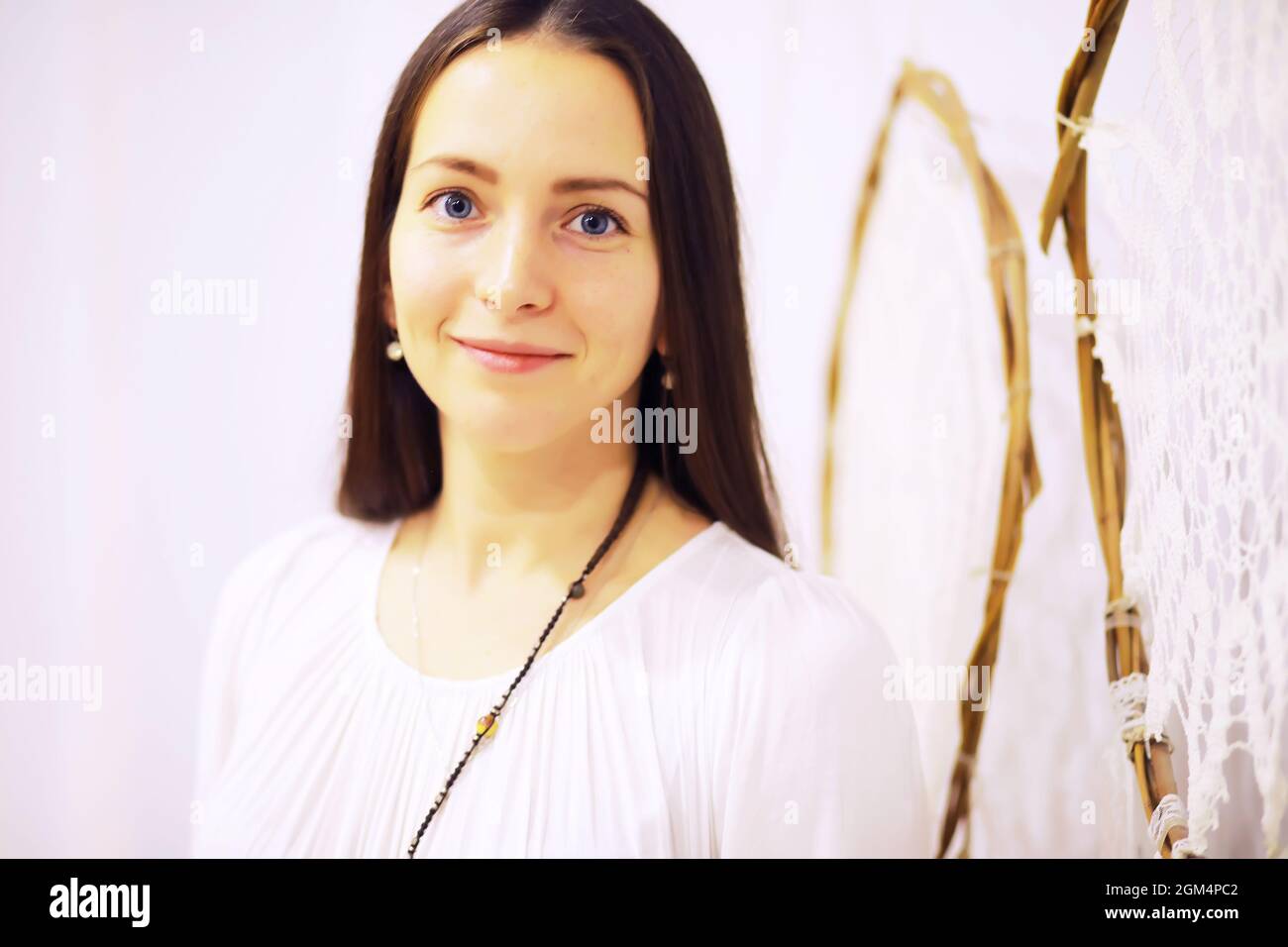 Relaxed serene pretty young woman at home, happy calm lady dream enjoy ...