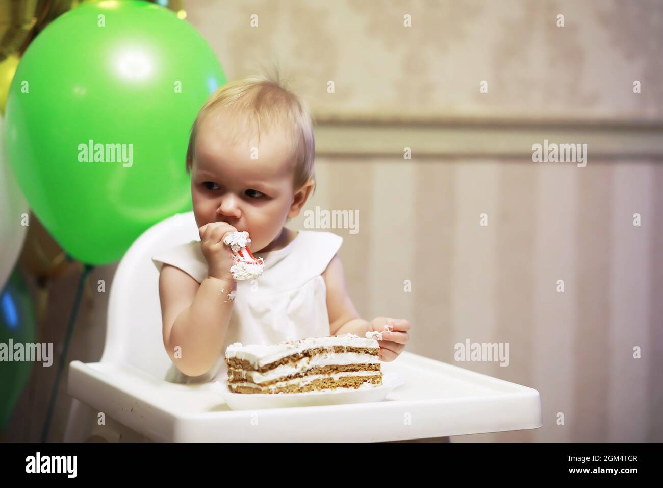 birthday one year old girl with baloons Stock Photo - Alamy