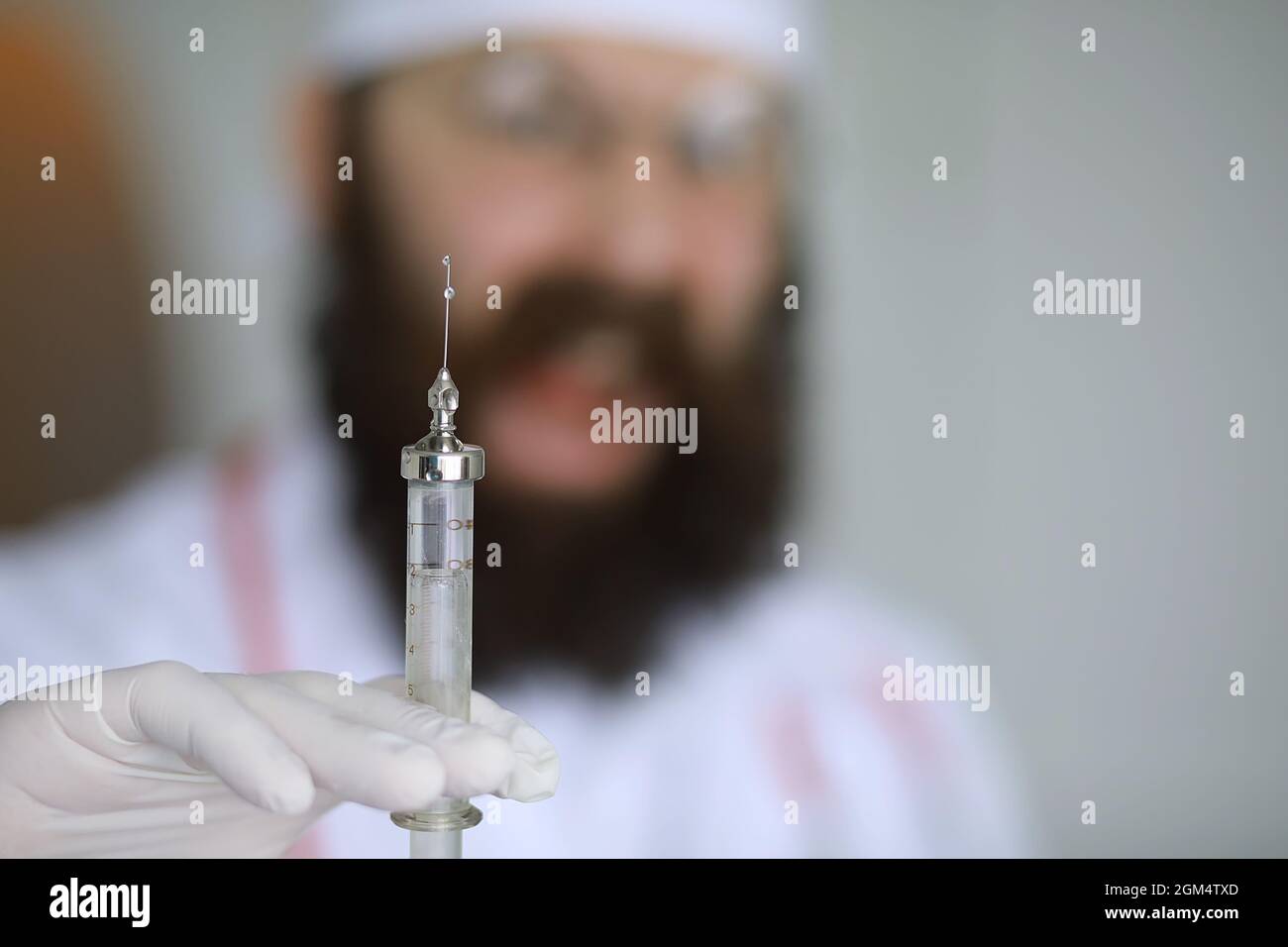 Doctor crazy. Mad beard scientist conducts experiments in a scientific ...