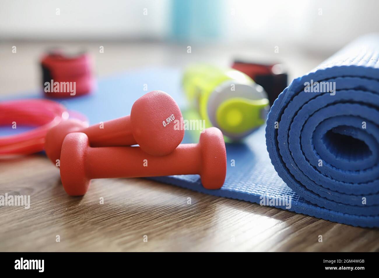 Sport and healthy lifestyle. Accessories for sports. Yoga mat dumbbell ...