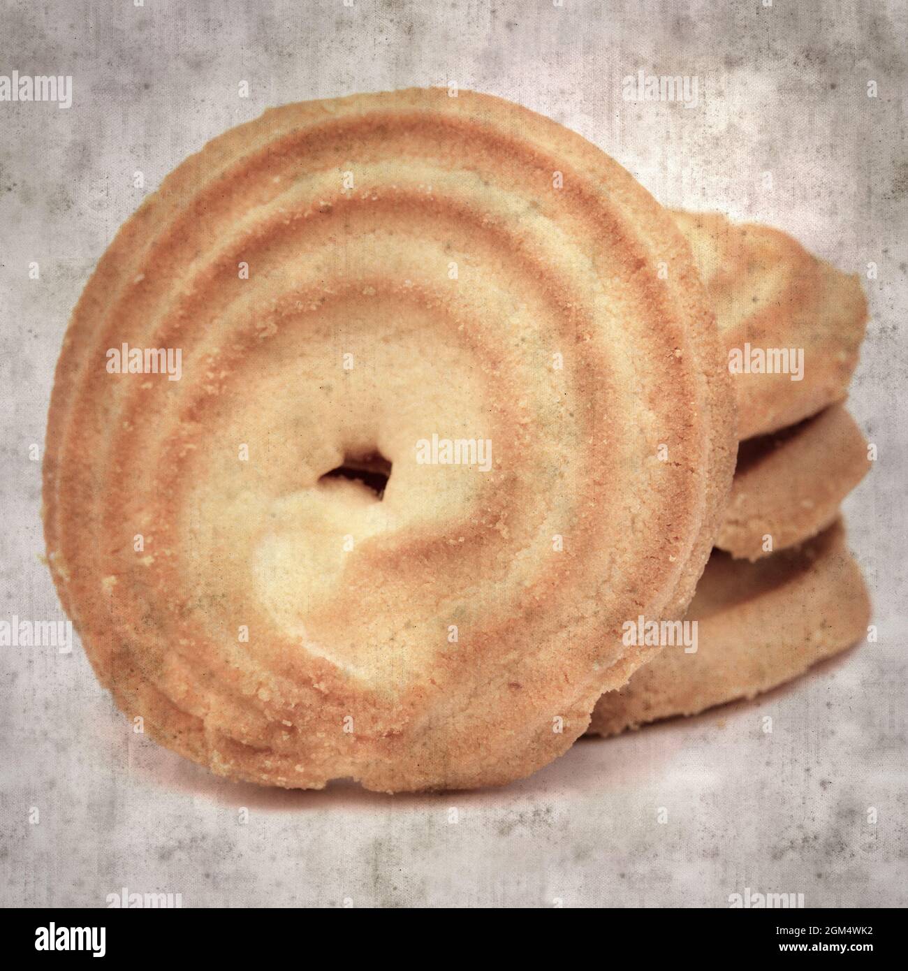 Stylish textured old paper background with shortbread ring cookies ...
