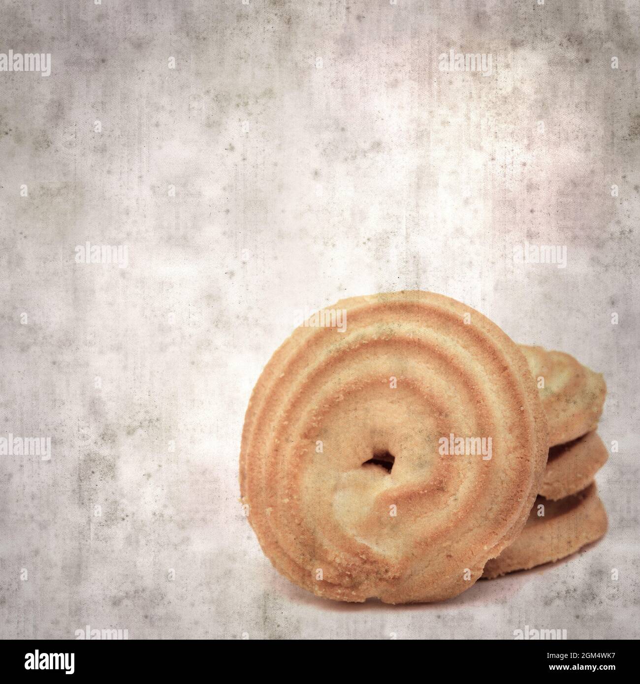 Stylish textured old paper background with shortbread ring cookies ...