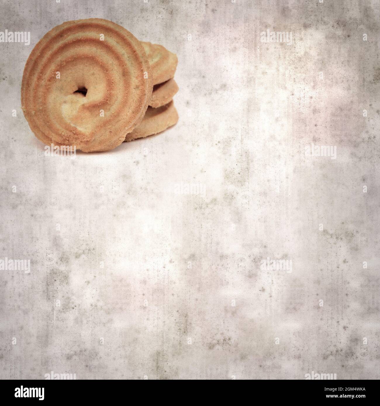 Stylish textured old paper background with shortbread ring cookies ...