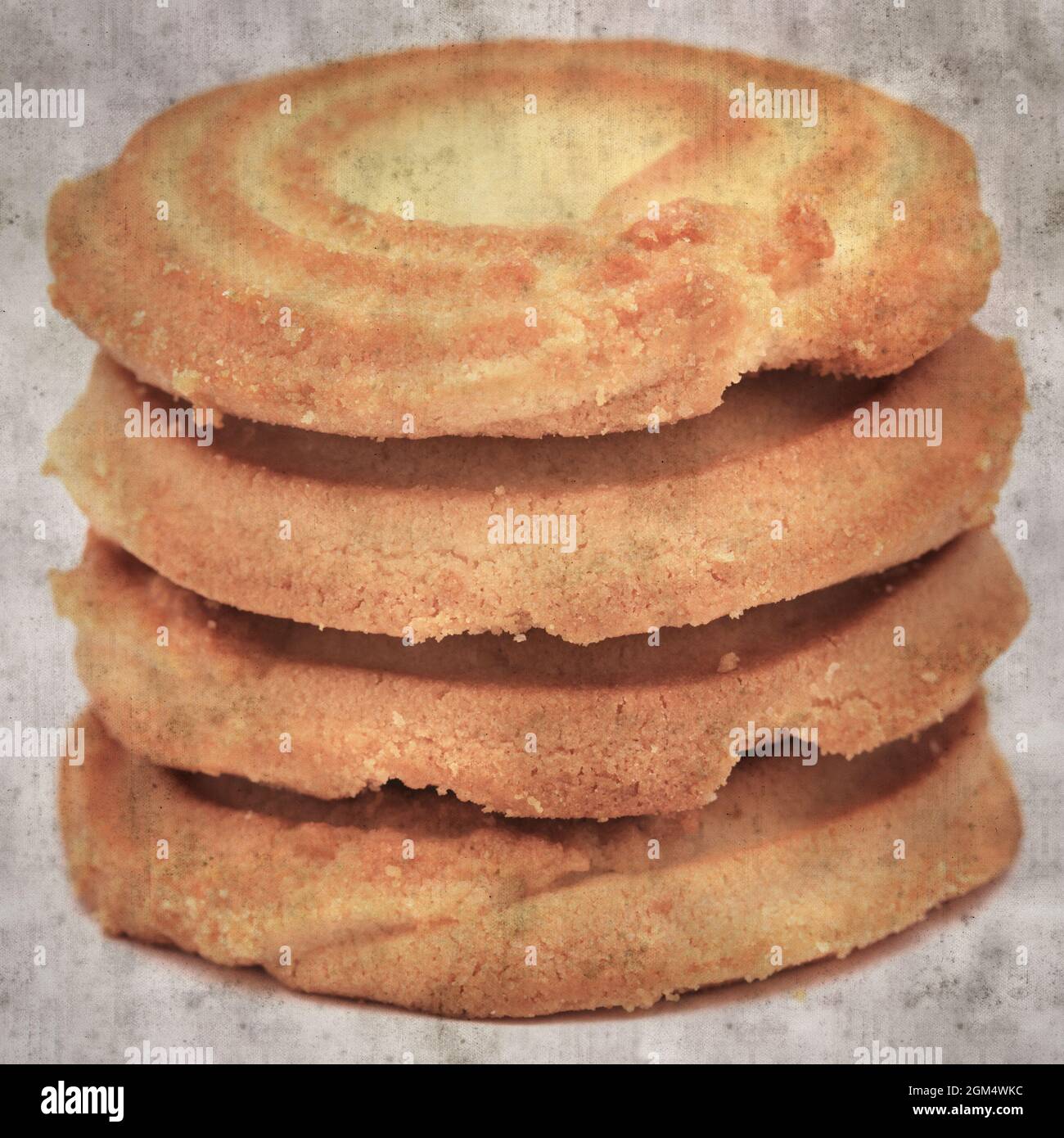 Stylish textured old paper background with shortbread ring cookies ...