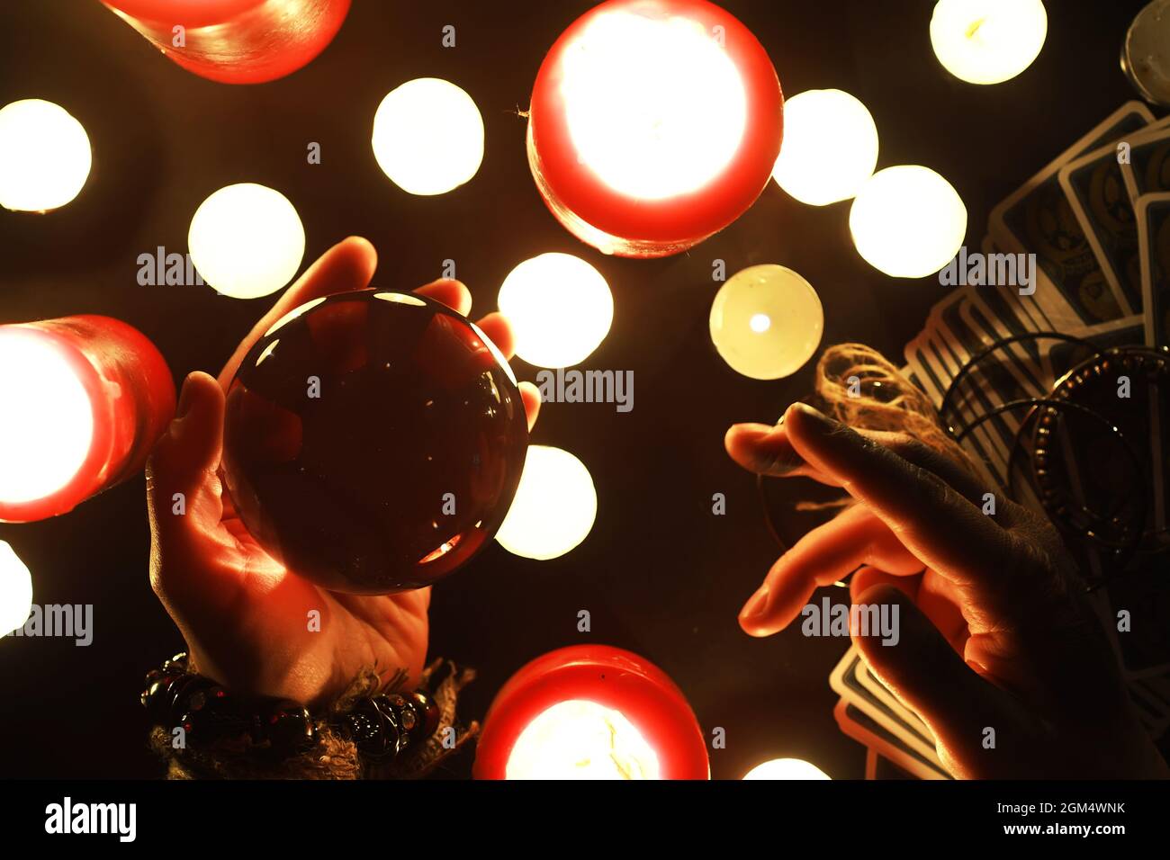 Mystic still life with voodoo doll, the tarot cards, books, evil ...