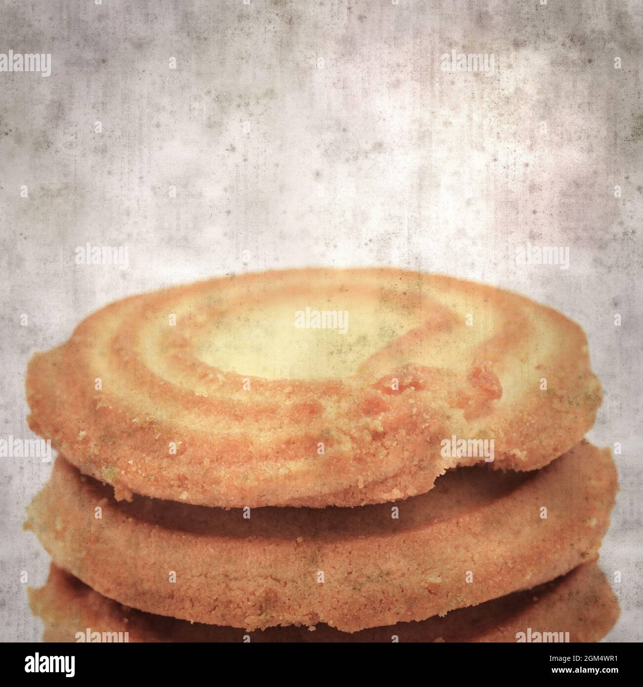 Stylish textured old paper background with shortbread ring cookies ...