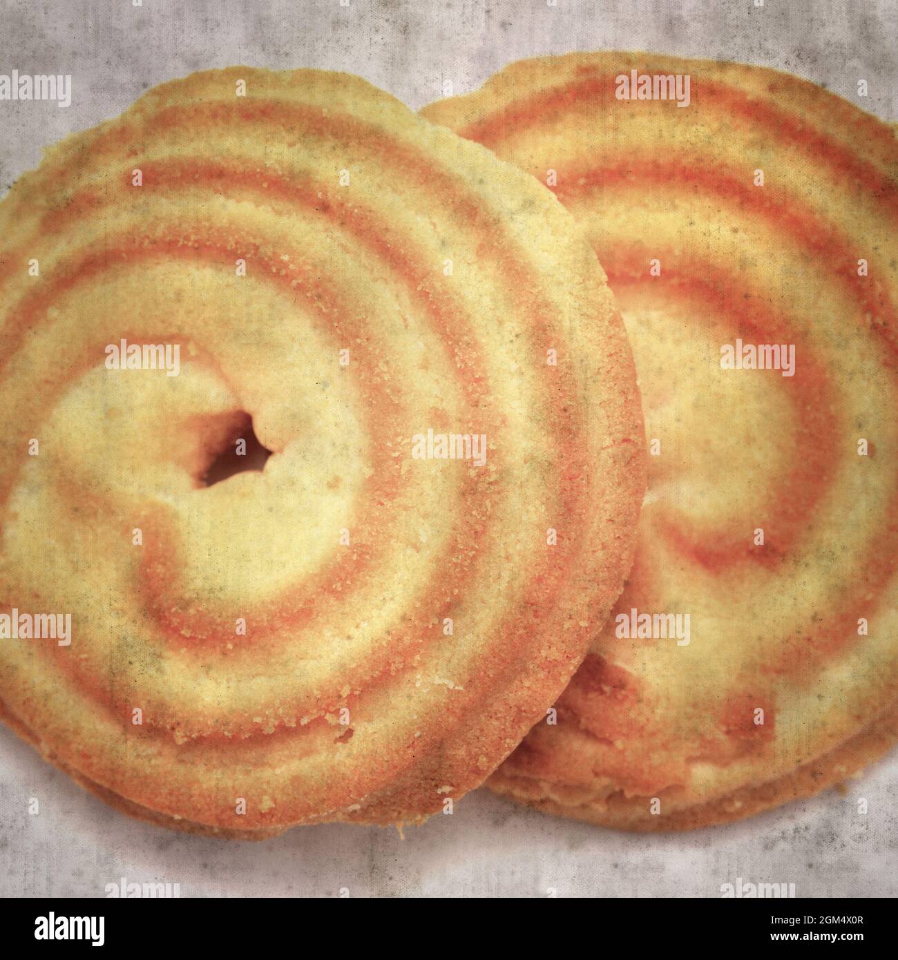 Stylish textured old paper background with shortbread ring cookies ...