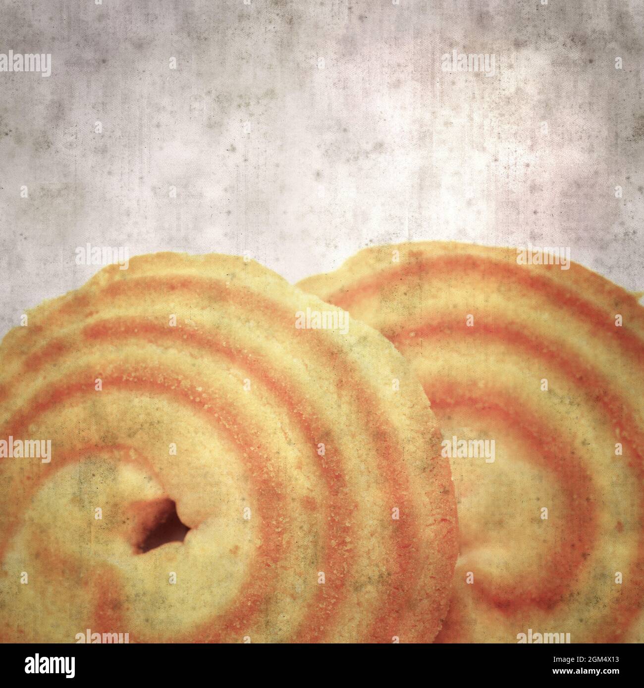 Stylish textured old paper background with shortbread ring cookies ...