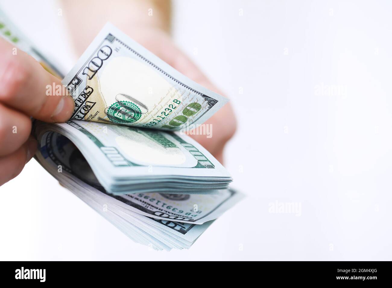 Cash money in a large pile as a finance background. Paper money close ...