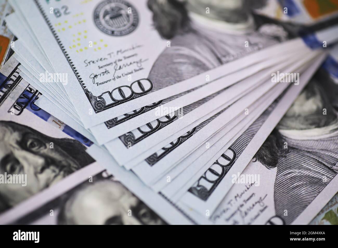 Cash money in a large pile as a finance background. Paper money close ...