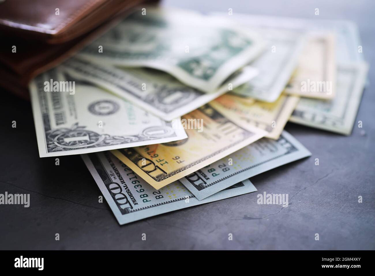 Cash money in a large pile as a finance background. Paper money close ...