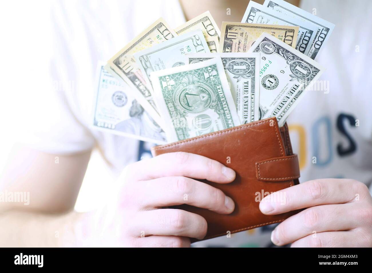 Cash money in a large pile as a finance background. Paper money close ...