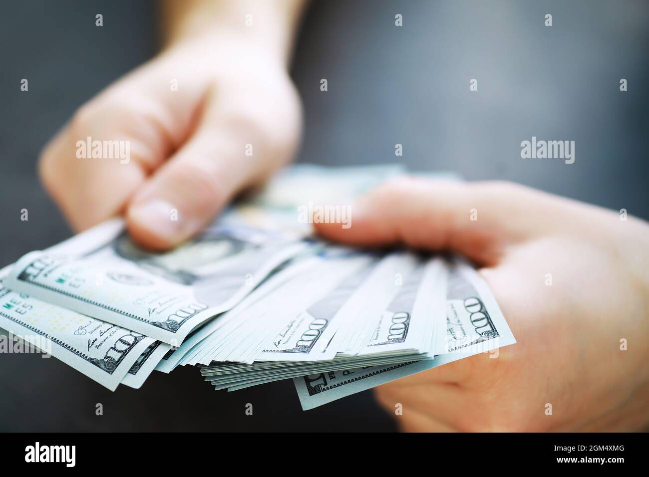 Cash money in a large pile as a finance background. Paper money close ...