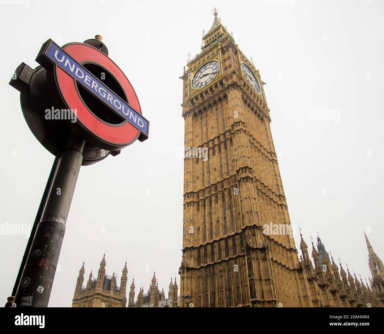 Juxtaposition of an Underground sign with the Big Ben clock tower ...