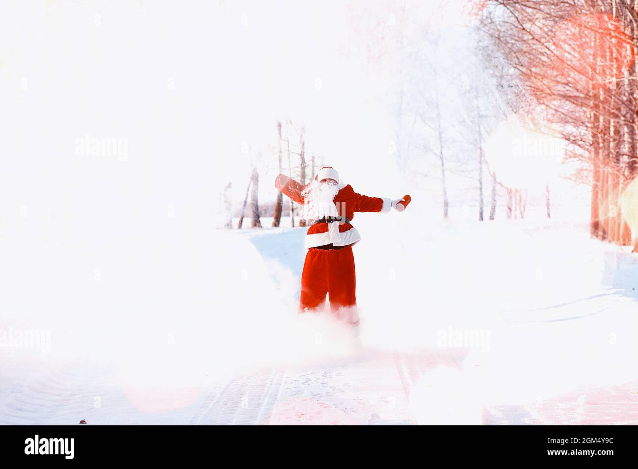Santa in the winter field. Santa magical fog walking along the field ...