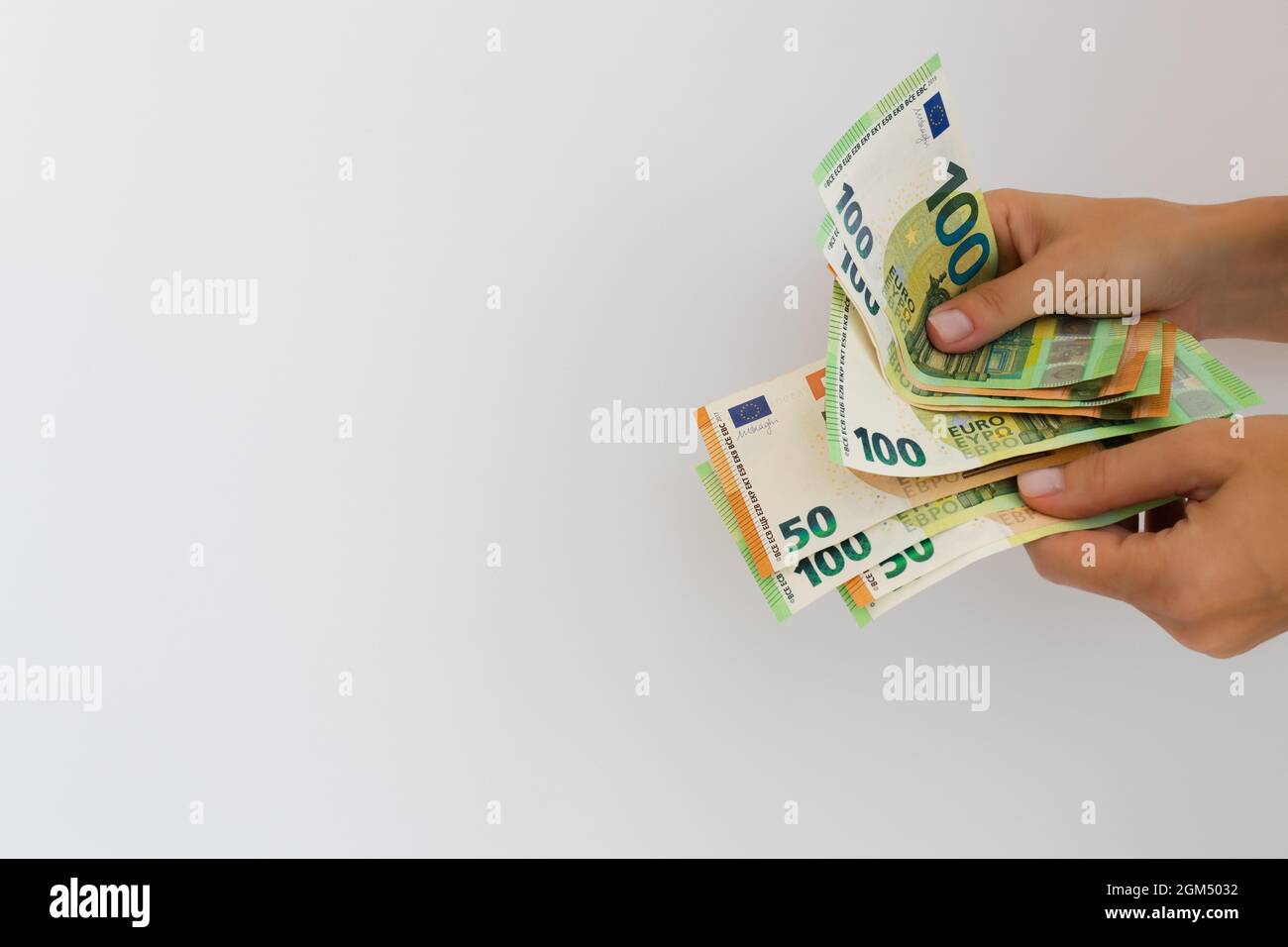 Hands counting euro money on hi-res stock photography and images - Alamy