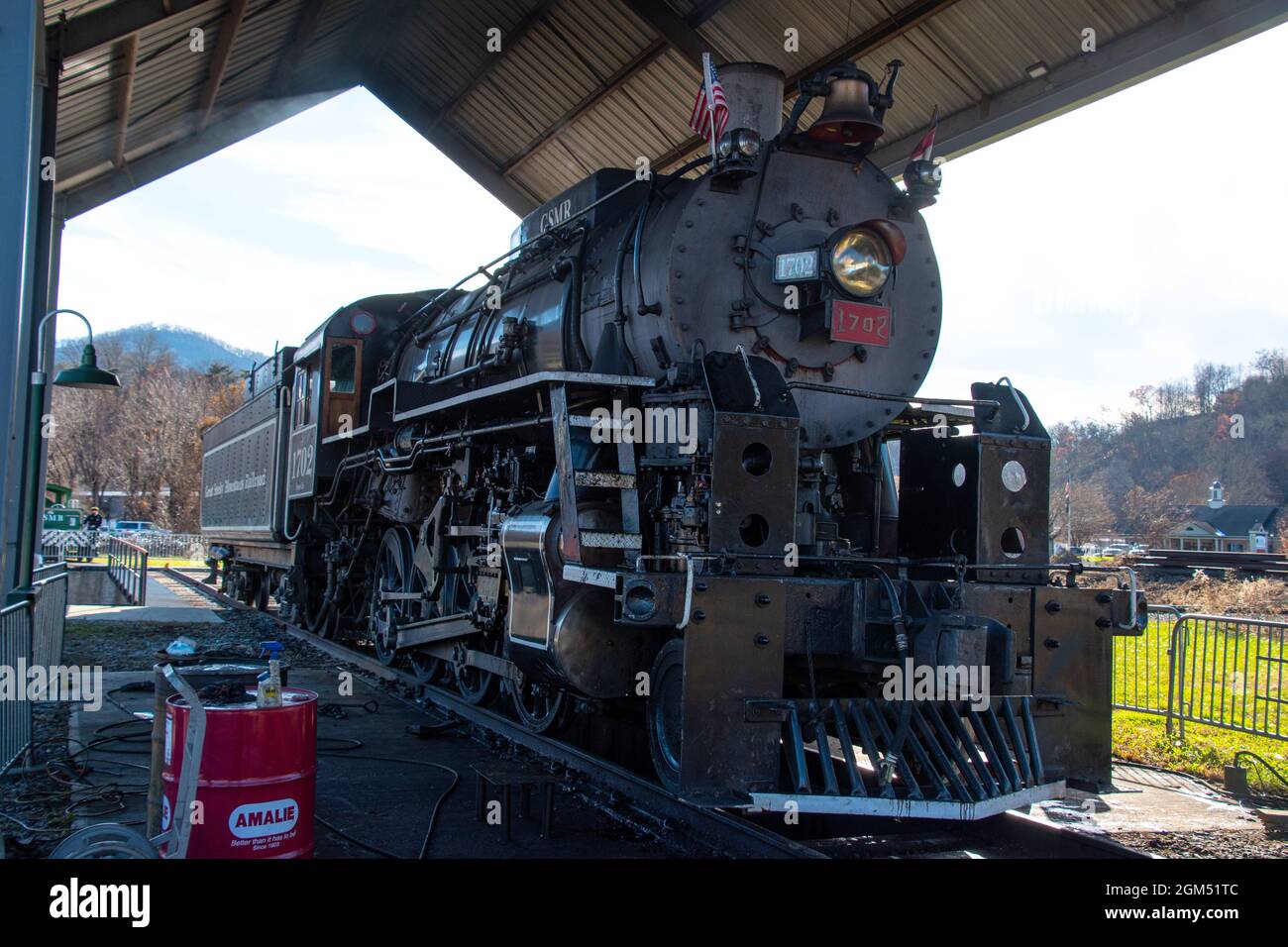 A steam powered locomotive on the train tracks in the Great Smoky ...