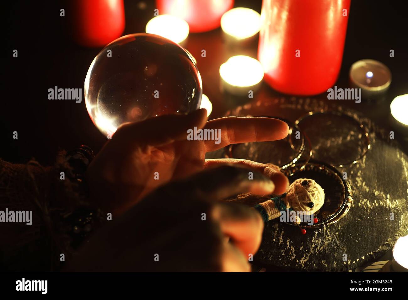 Mystic still life with voodoo doll, the tarot cards, books, evil ...