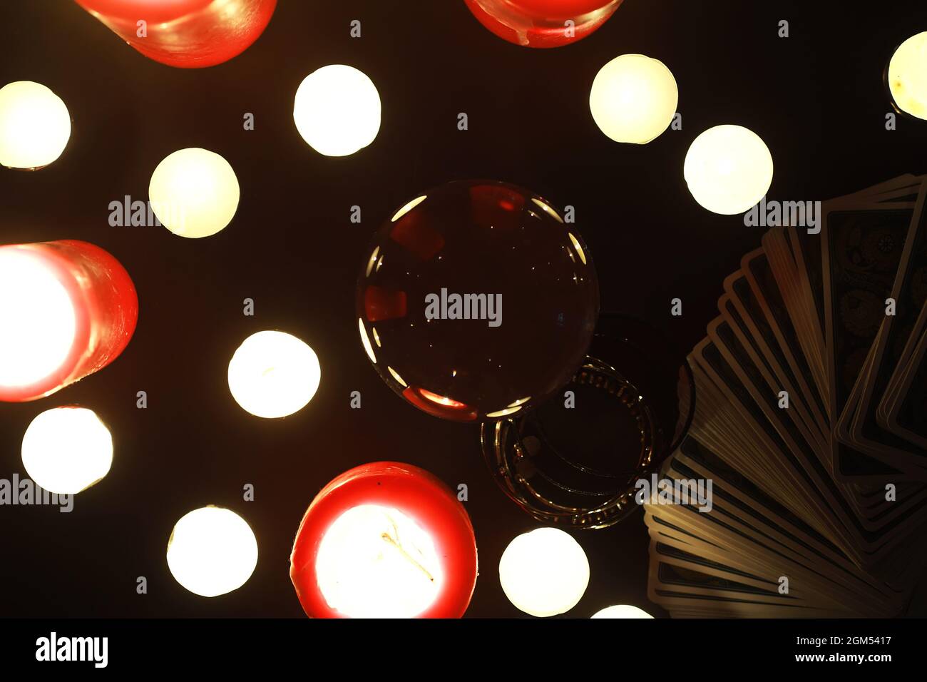 Mystic still life with voodoo doll, the tarot cards, books, evil ...