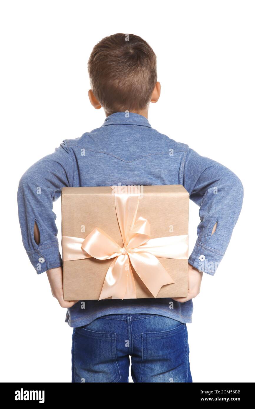 Cute little boy hiding gift for Mother's Day behind his back, on white ...
