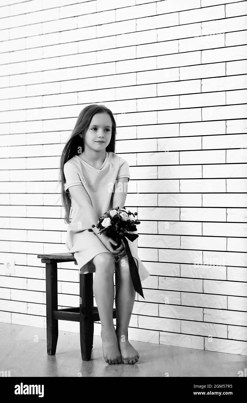 Vintage children sad chair hi-res stock photography and images - Alamy