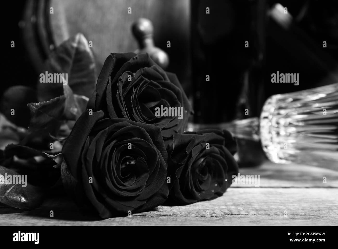 Beautiful roses on wooden table, closeup Stock Photo - Alamy
